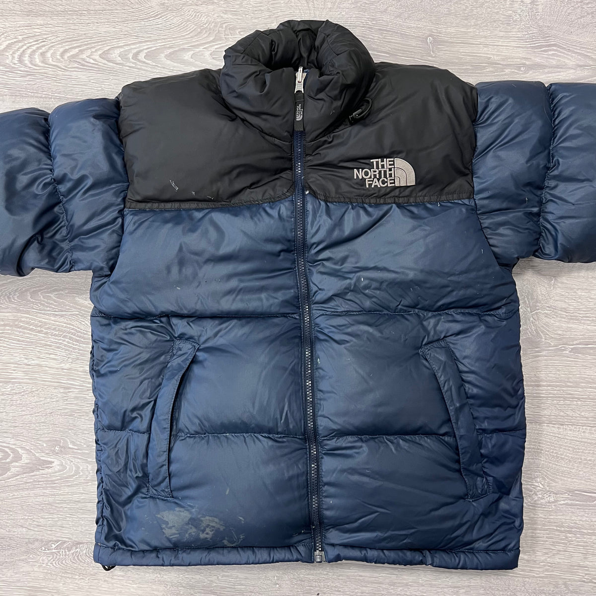 The North Face Navy Blue Puffer Jacket WITH STAIN | We Vintage